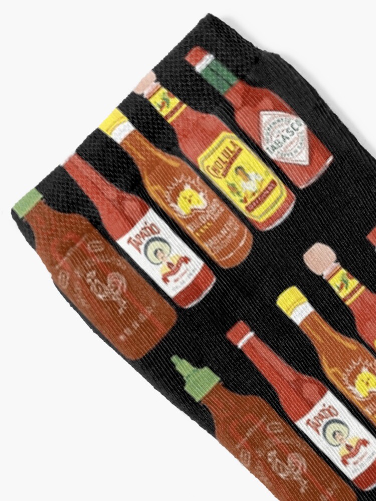 Spicy! Check Out These Hot Sauces On Black Background | Socks