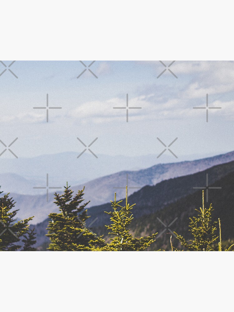 "Clam grey, foggy forest mountains with clouds in the background ...