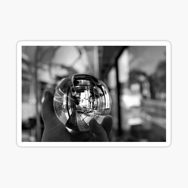 "Black and white urban life seen through an Orb" Sticker for Sale by ...