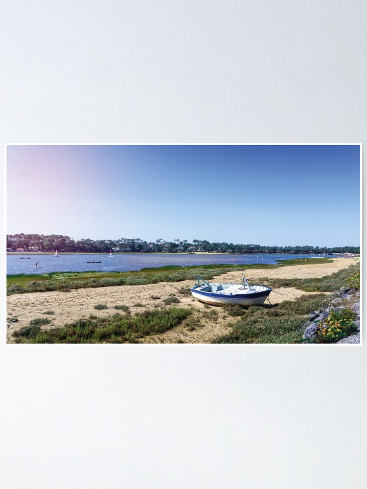 "The marine lake of Hossegor, boat stranded on the beach and nautical ...
