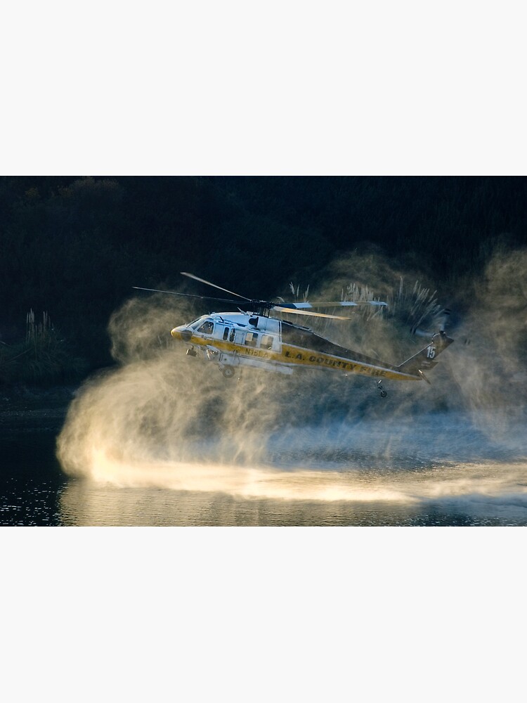 "Fully loaded. L.A. County fire helicopter fill water at Lauro ...