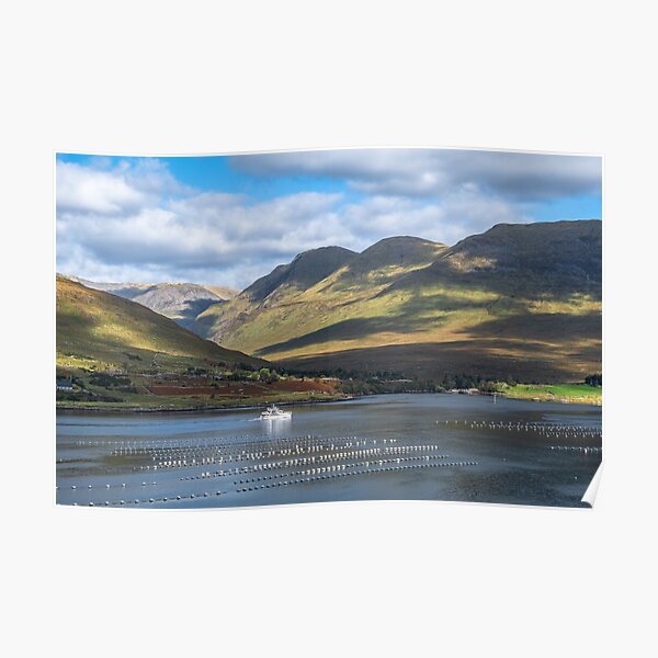 "A ship sailing in an Atlantic bay between majestic mountains in ...