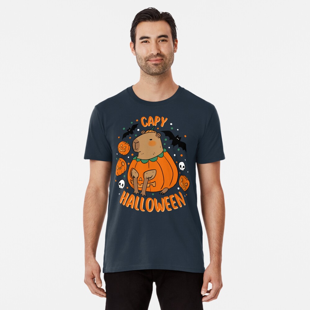 "Happy Halloween a cute capybara waring a pumpkin costume for Halloween ...