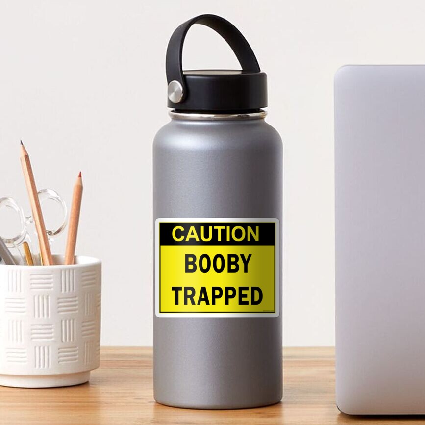 "CAUTION: BOOBY TRAPPED" Sticker for Sale by flinters | Redbubble