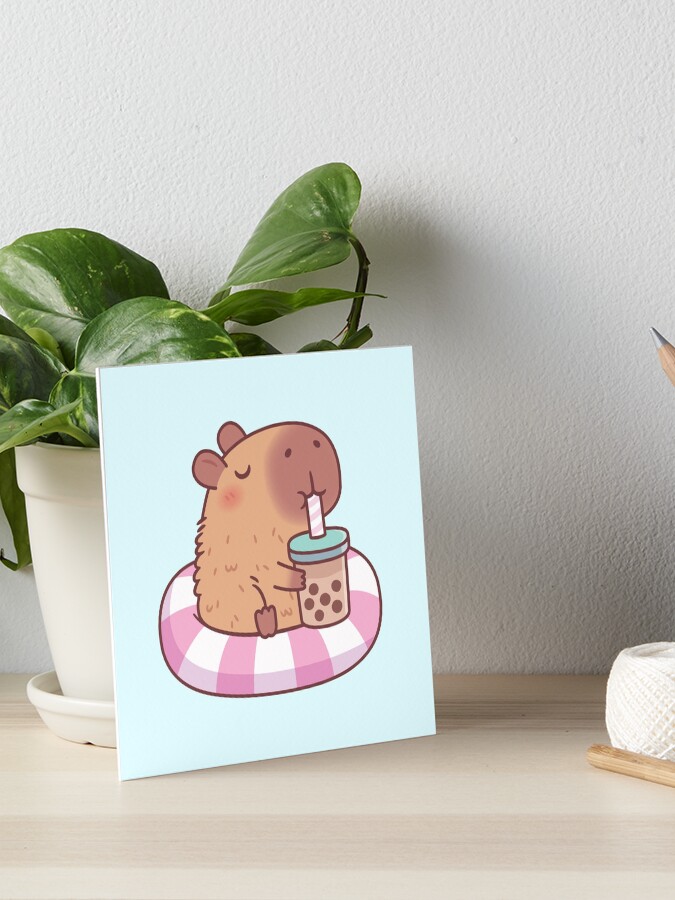 "Cute Capybara On Pool Float Drinking Bubble Tea " Art Board Print for ...