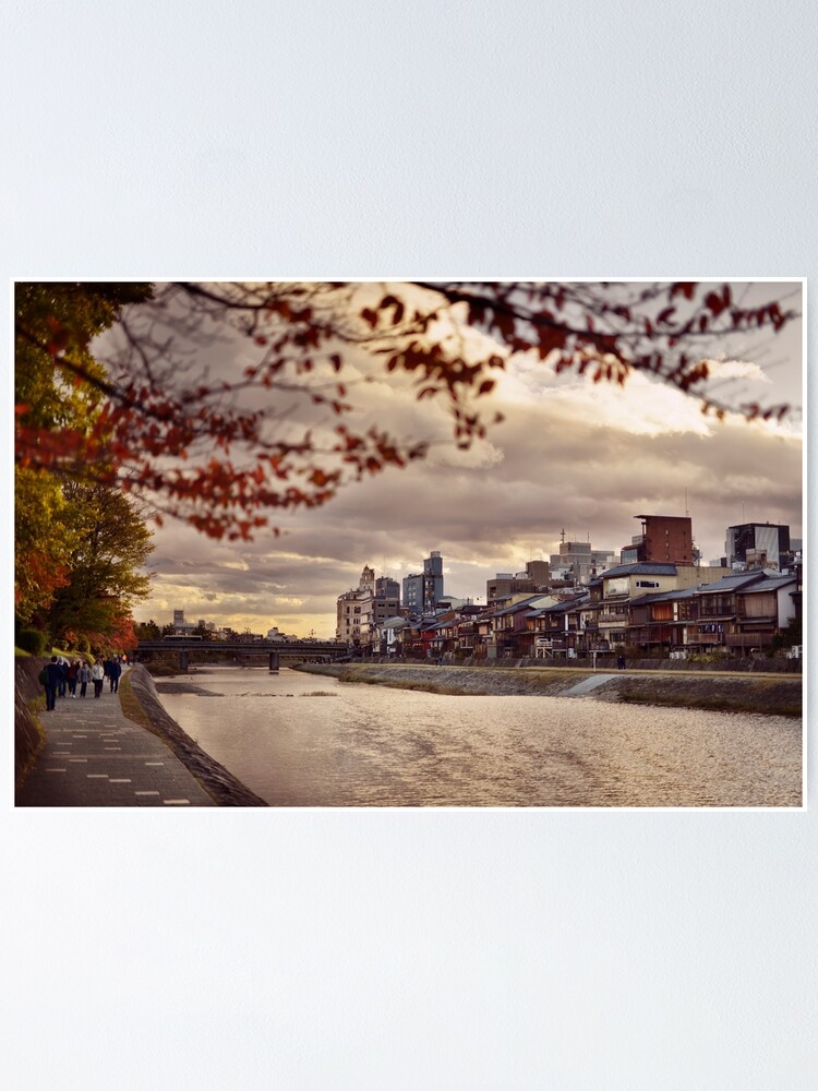 "Pathway along Kamo River in a beautiful dramatic autumn sunset scenery ...