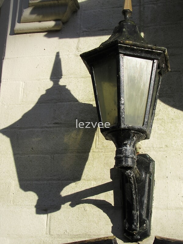 "A Wall Lamp And Its Shadow" by lezvee | Redbubble