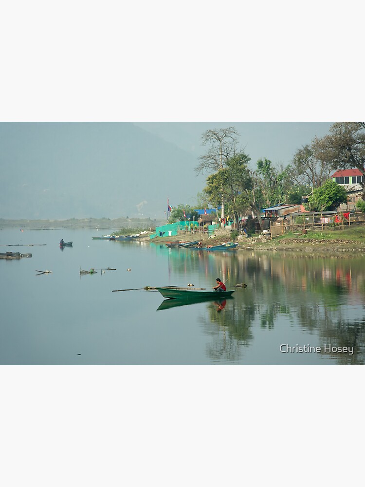 "Fishing boat on Phewa Tal " Sticker for Sale by christinehosey | Redbubble