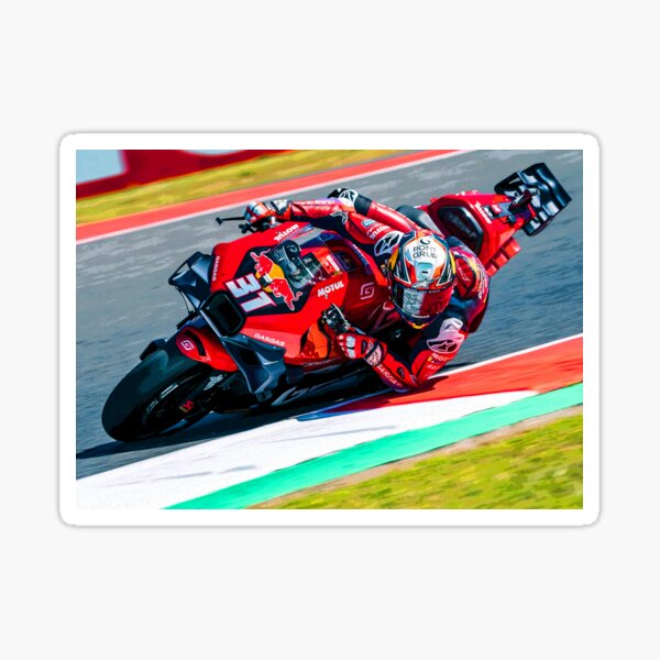 "Pedro Acosta racing his MotoGP motorcycle through the corners of ...