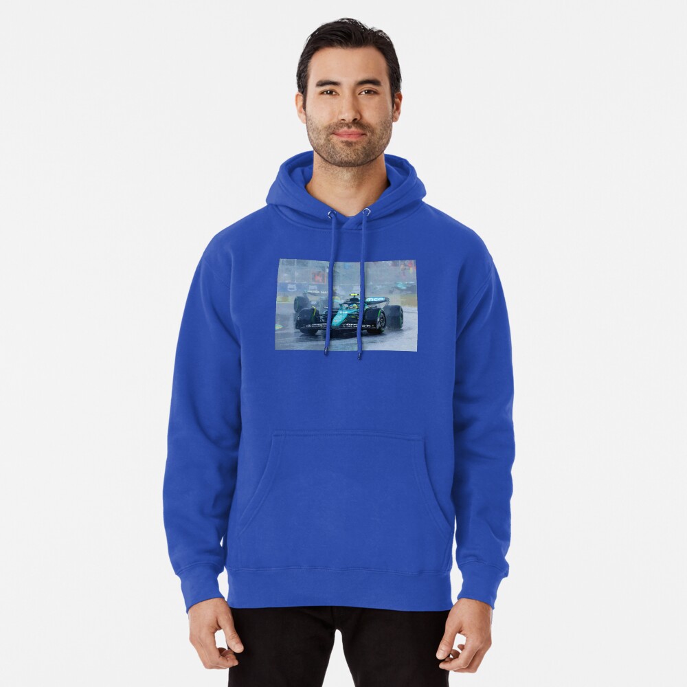 "Fernando Alonso racing his 2024 F1 racecar in the rain in front of ...