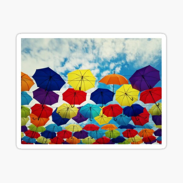 "the floating umbrellas" Sticker for Sale by psychoshadow | Redbubble
