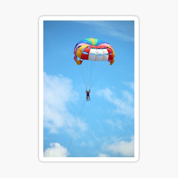 "Two people parasailing with parachute on blue sky with clouds" Sticker ...