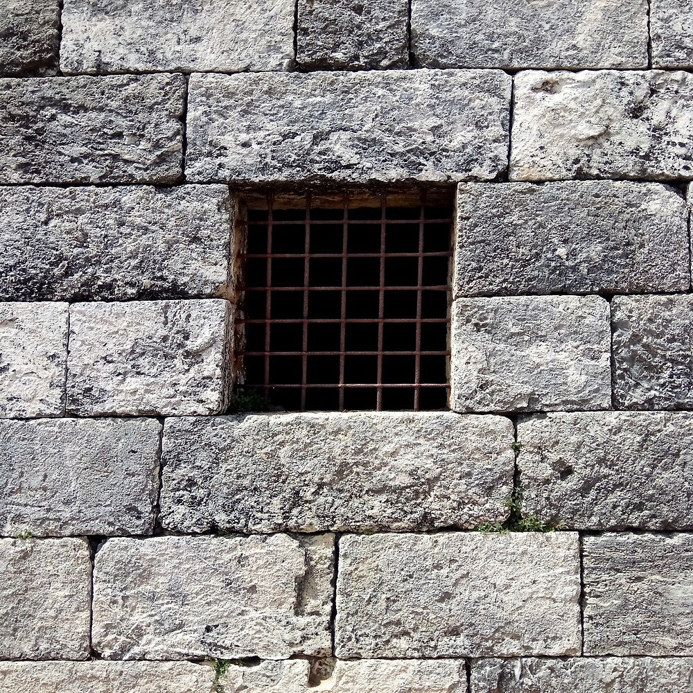 "stone rock wall prison jail window " by Bernat Comes | Redbubble