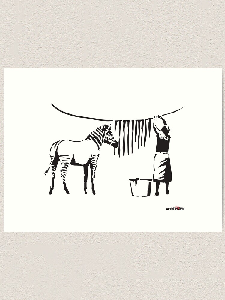 "Banksy Graffiti Zebra stripes on a clothing line and a woman with ...