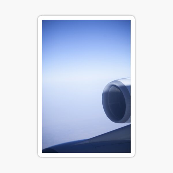 "Jumbo jet airplane wing engine in flight flying over blue sky photo ...