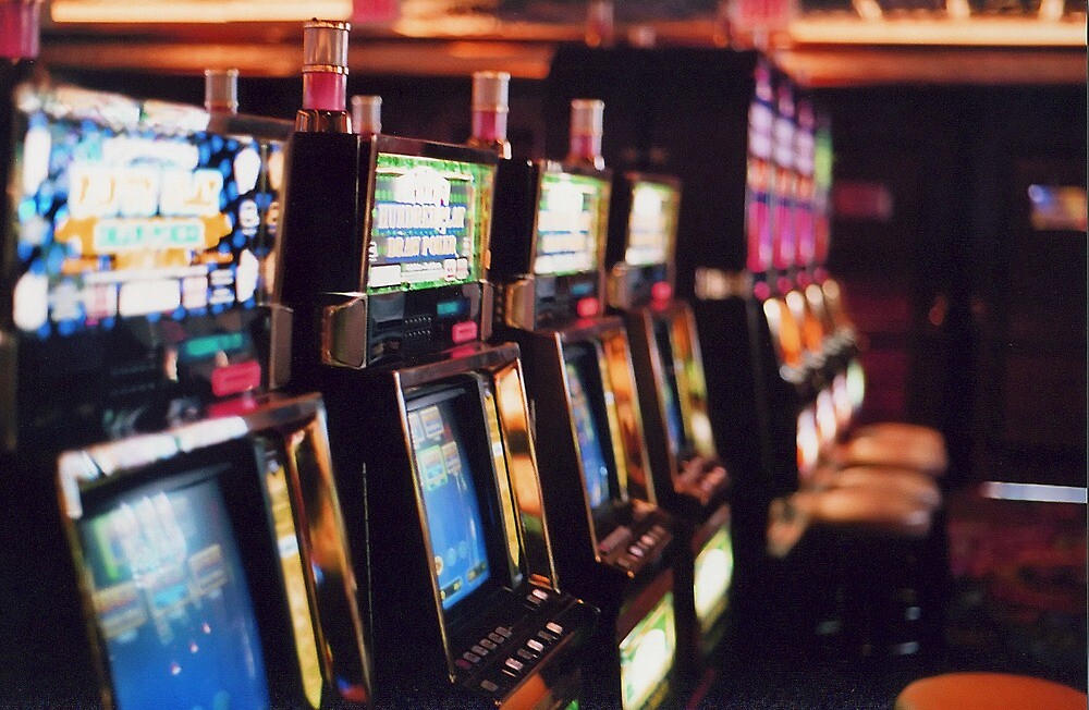 "Row of Slot Machines, Stratosphere, Las Vegas" by Sam Goodman | Redbubble