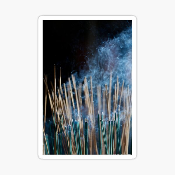 "Smoke from incense joss sticks in a Japanese temple lit by sunlight ...