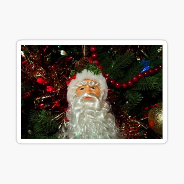 "Santa, with a long beard, hanging on a Christmas tree" Sticker by ...