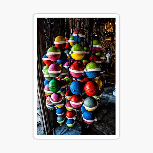 "Colorful Buoys hanging " Sticker for Sale by fineartbyK | Redbubble