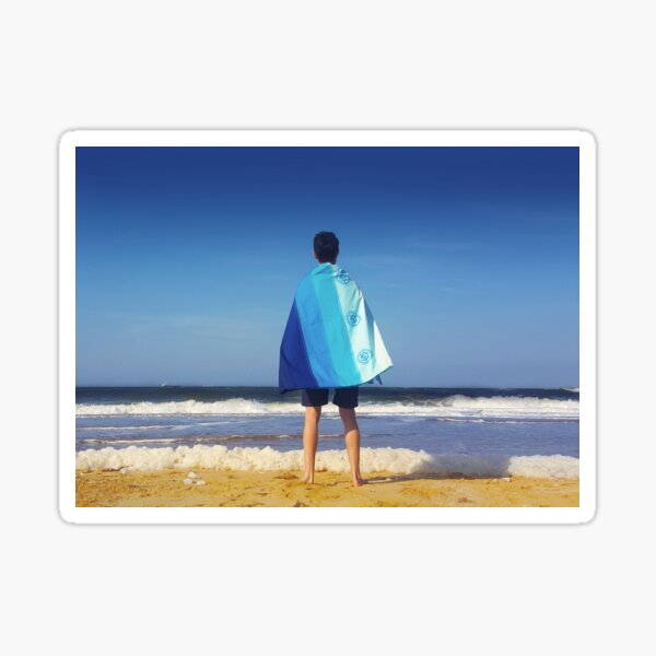 "Wanderlust boy at the seaside, wearing cape" Sticker for Sale by SaraM ...