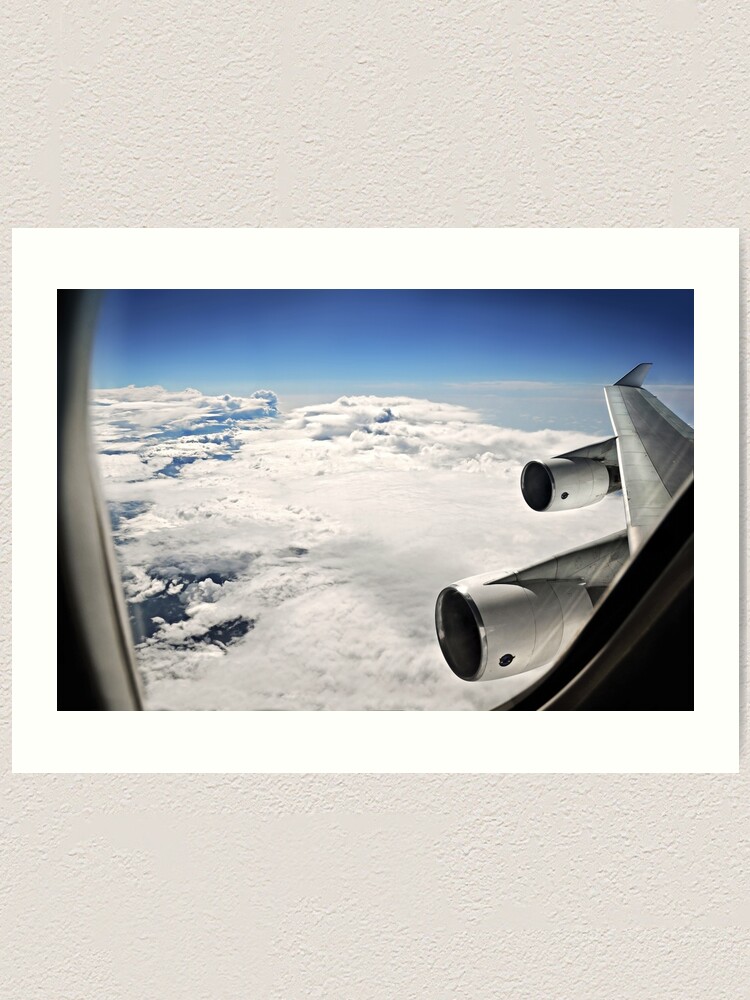 "Airplane window view of the wing and 2 jet engines of the Boeing 747 ...