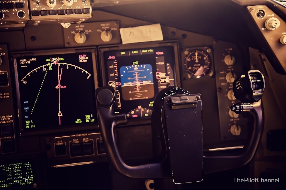 "Boeing 747 Control wheel and instruments in cockpit" by ...