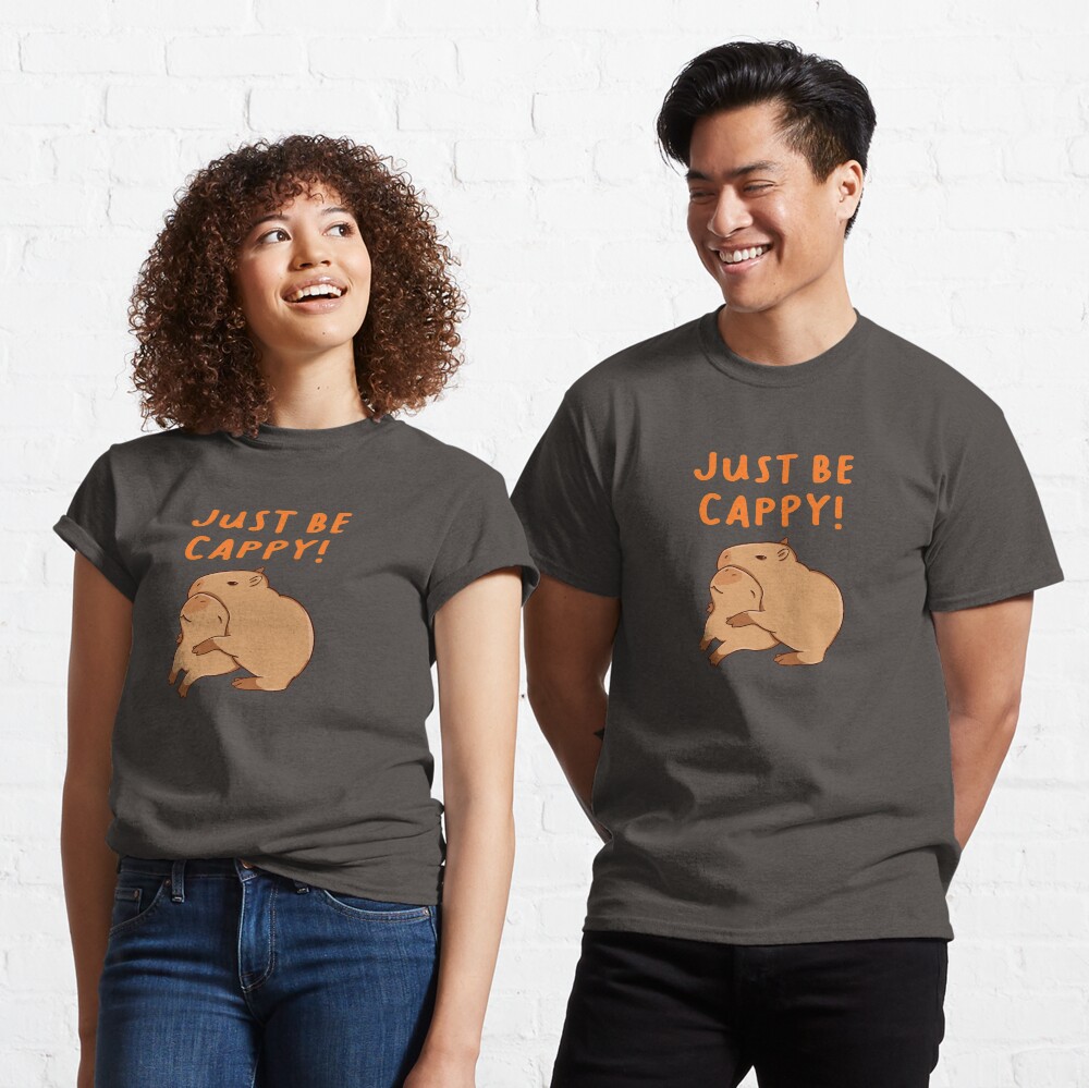 "Just be cappy! And hug a capybara" Sticker for Sale by manydoodles ...